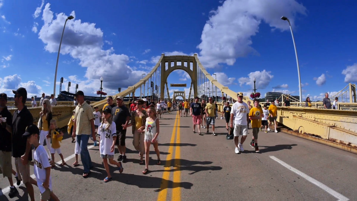 Pittsburgh Pirates fans walk over the Roberto Clemente Bridge after a ...